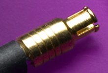 SMA Straight Bulkhead Jack to MCRF Right-Angle Plug on 1.13mm Cable, 60.00mm Length, 50 Ohms